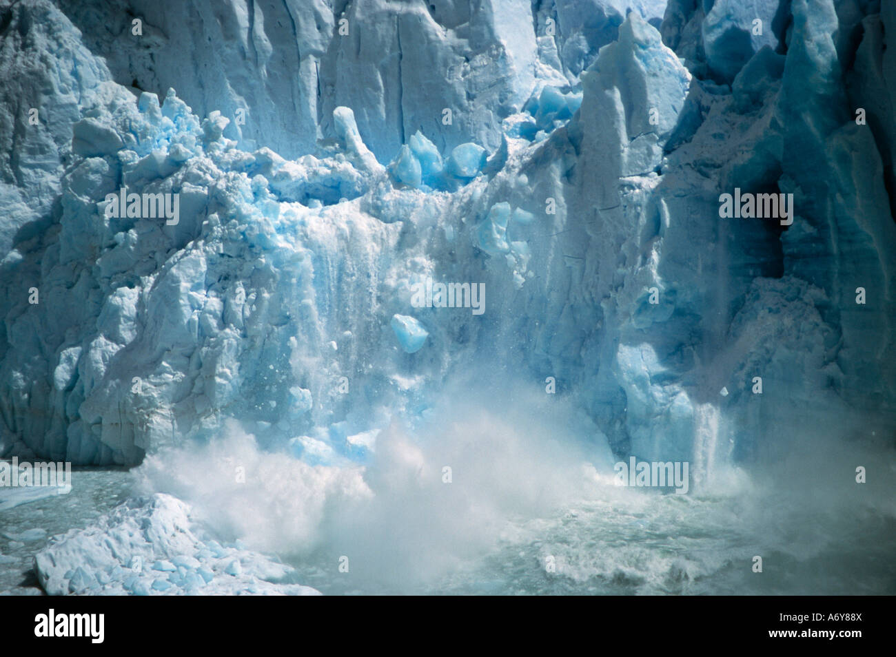 Ice breaking off a glacier Stock Photo - Alamy