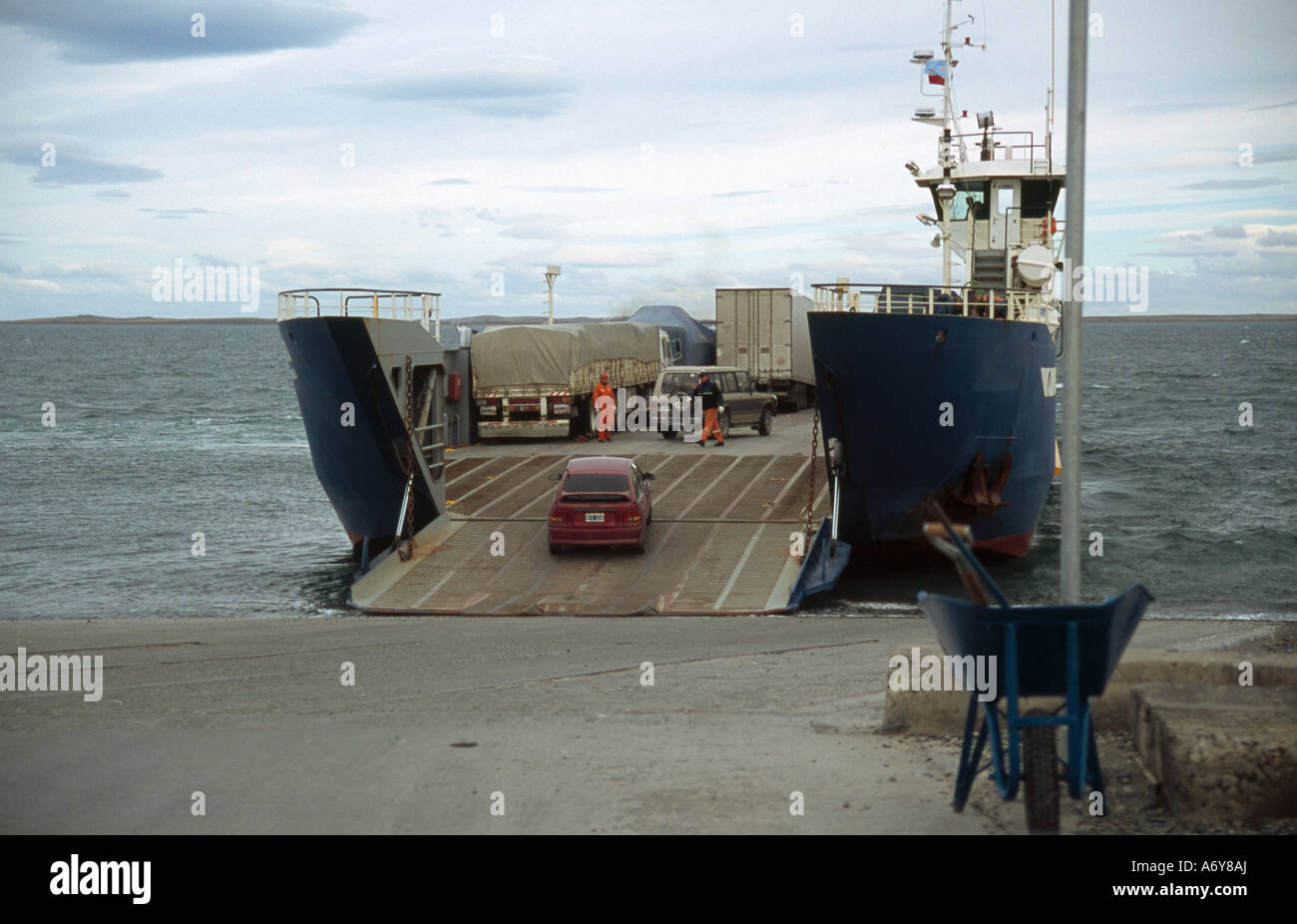 Cars and trucks loading onto a ferry Stock Photo - Alamy