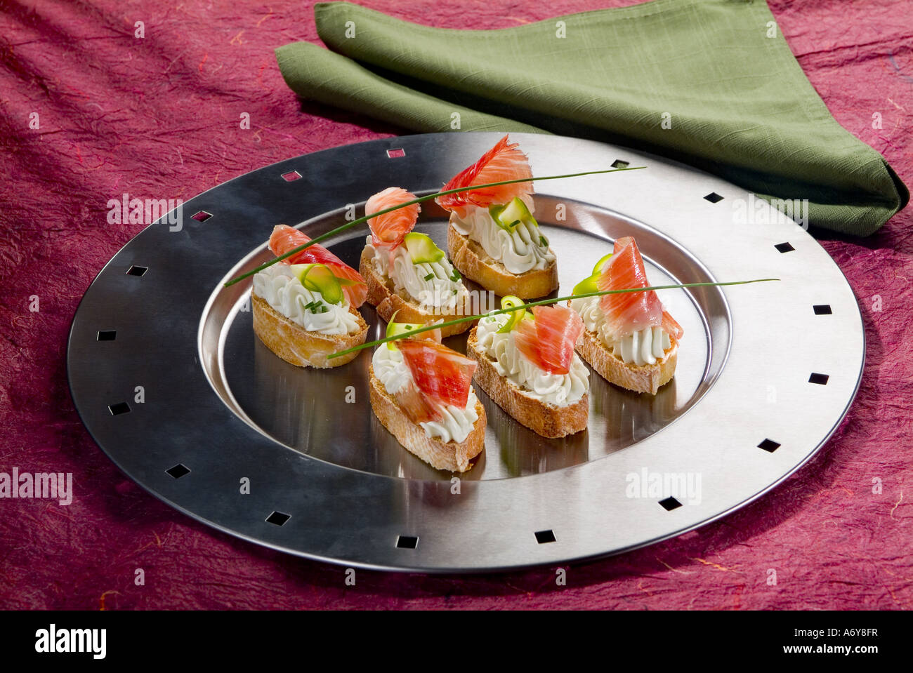 Tray of ciabatta toasts with Philadelphia blue cheese and Iberian ham ...