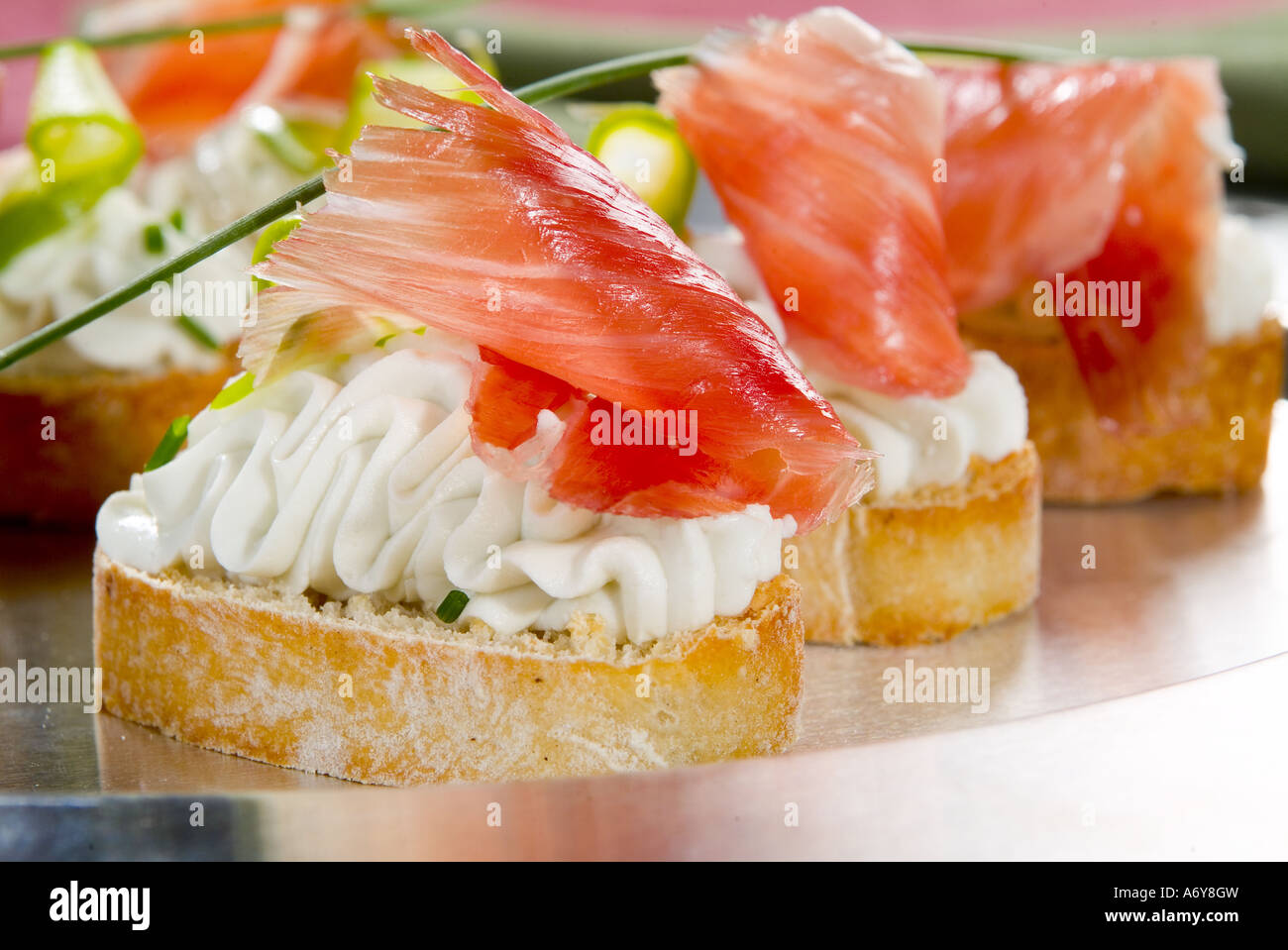 Tray of ciabatta toasts with Philadelphia blue cheese and Iberian ham ...