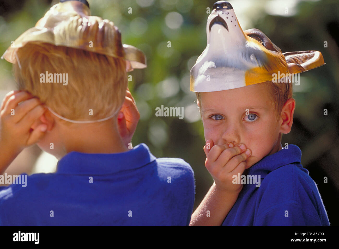portrait of two boys wearing masks Stock Photo - Alamy