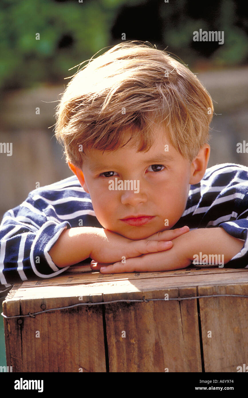 portrait of an offended boy Stock Photo - Alamy