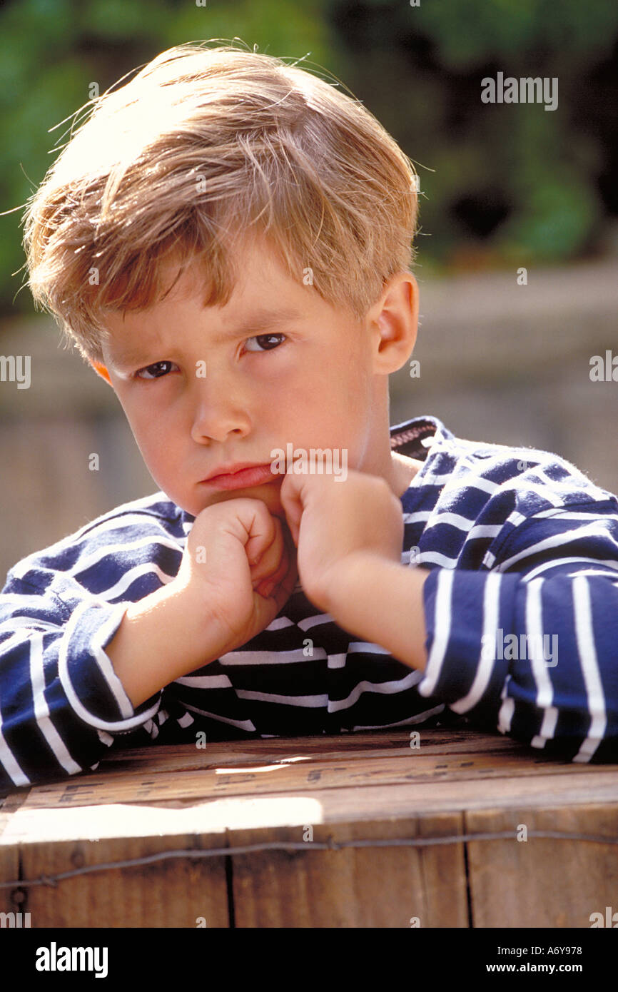 portrait of an offended boy Stock Photo - Alamy