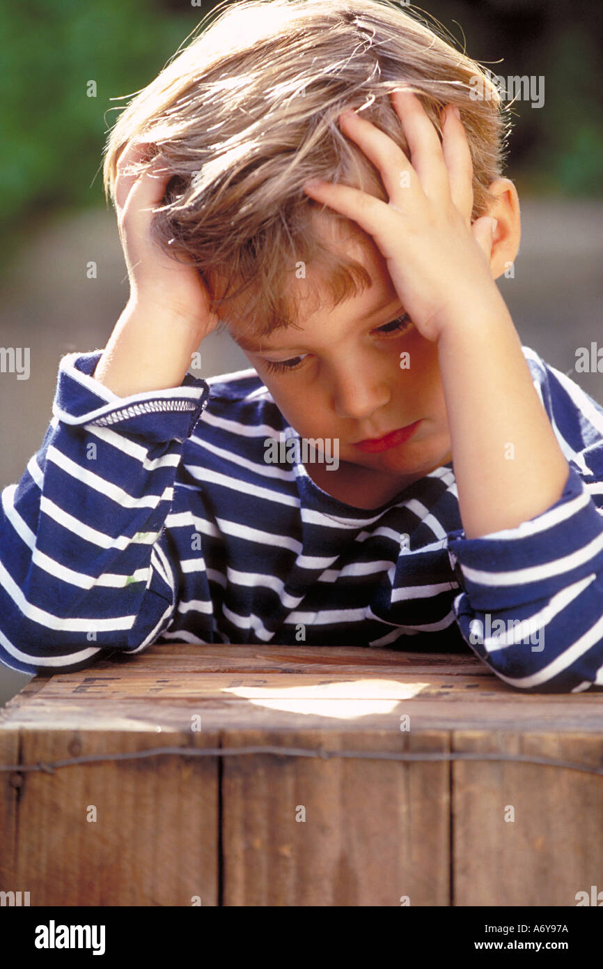 portrait of a sad boy Stock Photo - Alamy