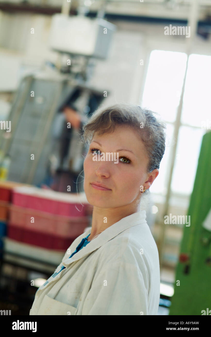 Female factory worker Stock Photo - Alamy