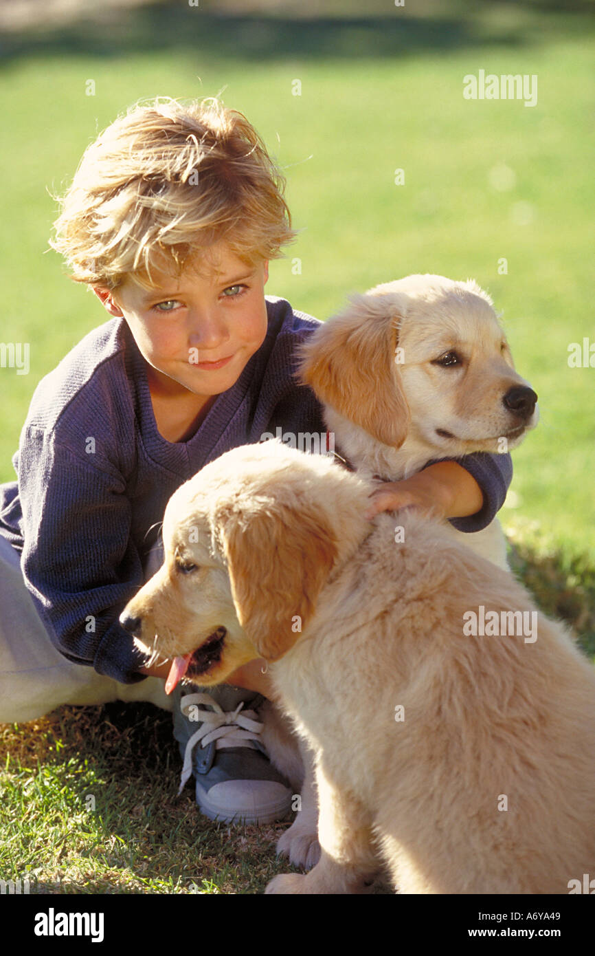Boy with dogs hi-res stock photography and images - Alamy