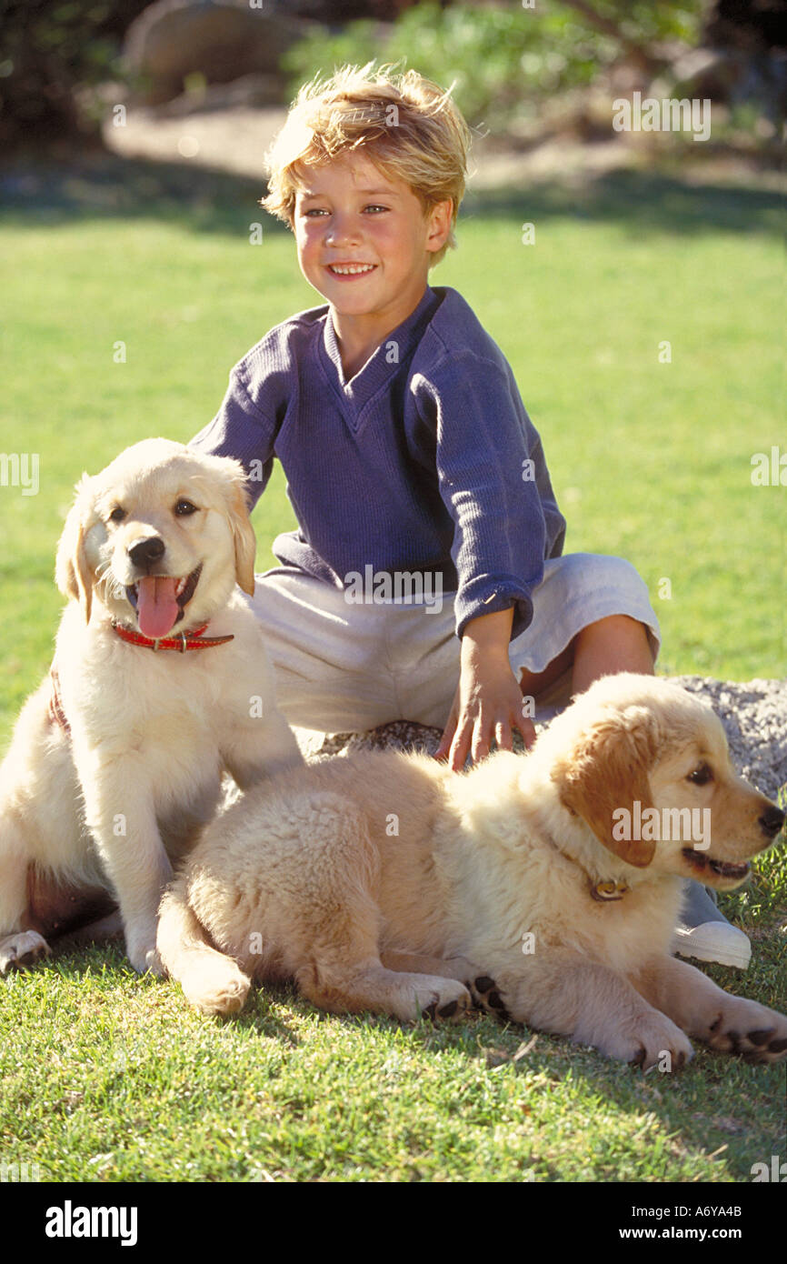 Boy with dogs hi-res stock photography and images - Alamy