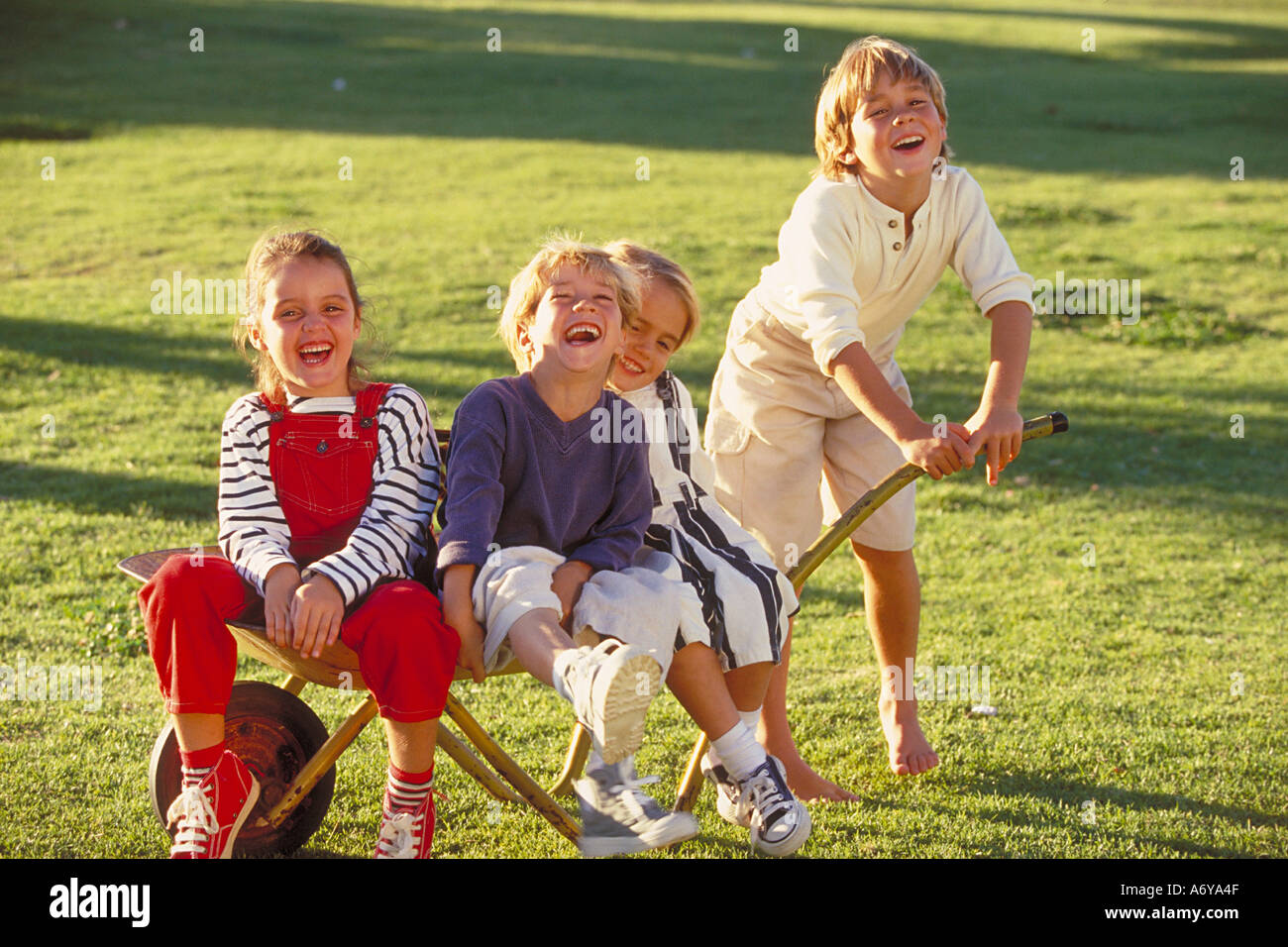 Kids wheel barrow hi-res stock photography and images - Alamy