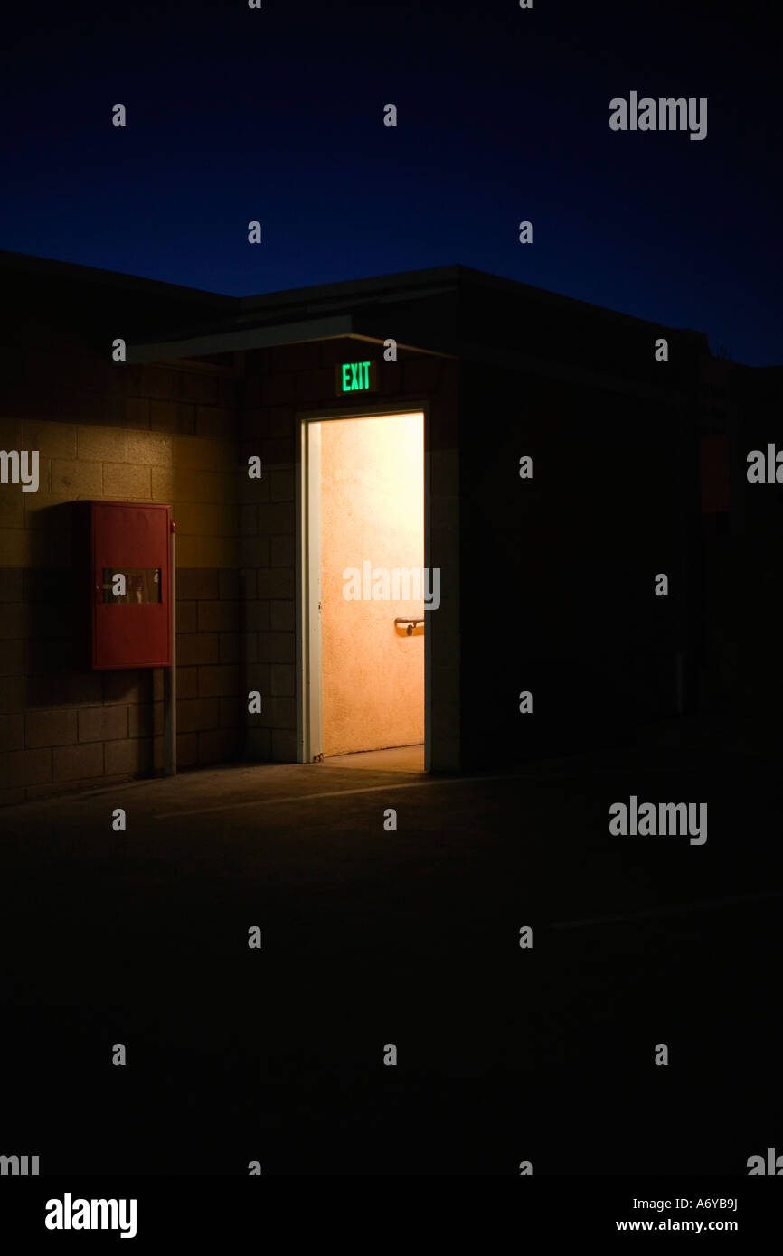 Illuminated doorway at night Stock Photo - Alamy