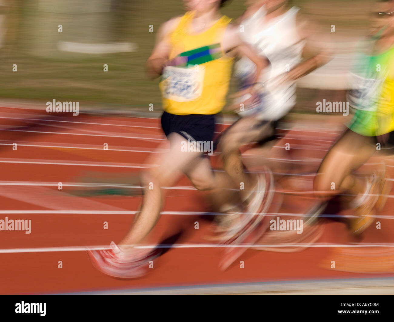 Group of athletes running in a race Stock Photo - Alamy