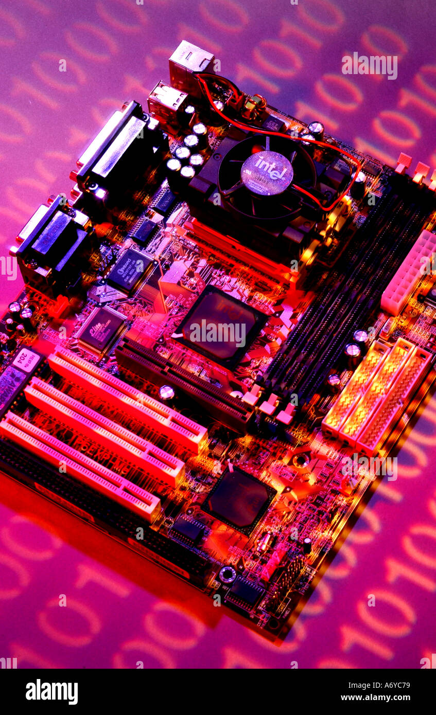Color image of cicuitry on a computer mother board with binary code ...