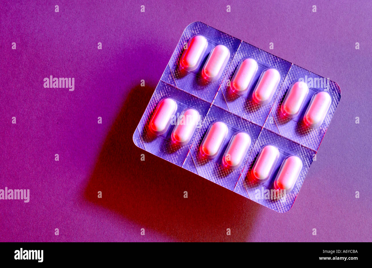 Horizontal color image of a packet of pills or capsules in a tamper ...