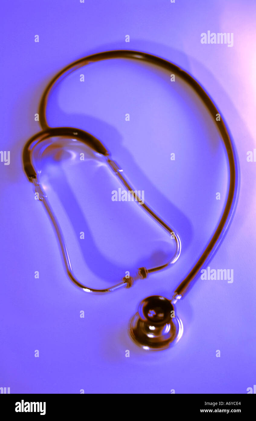 Vertical colored concept image of a stethoscope on a mult colored ...