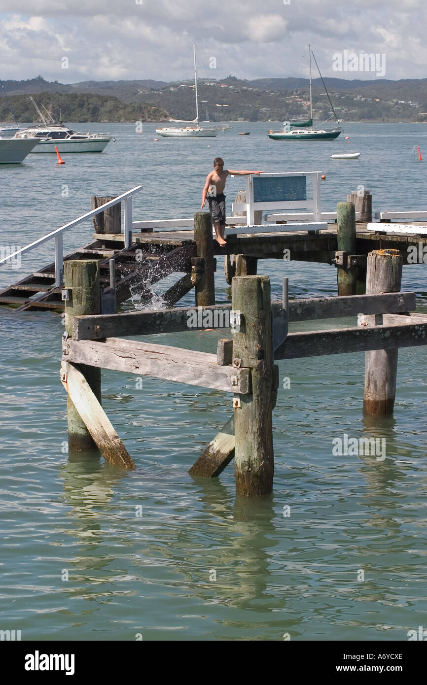 boy playing on jetty Russel Bay of islands New Zealand Stock Photo - Alamy