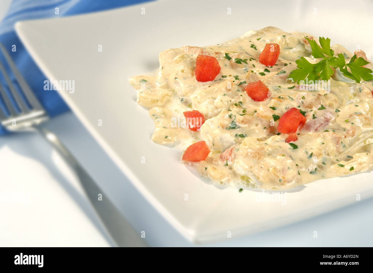 Sole with white wine sauce Stock Photo - Alamy