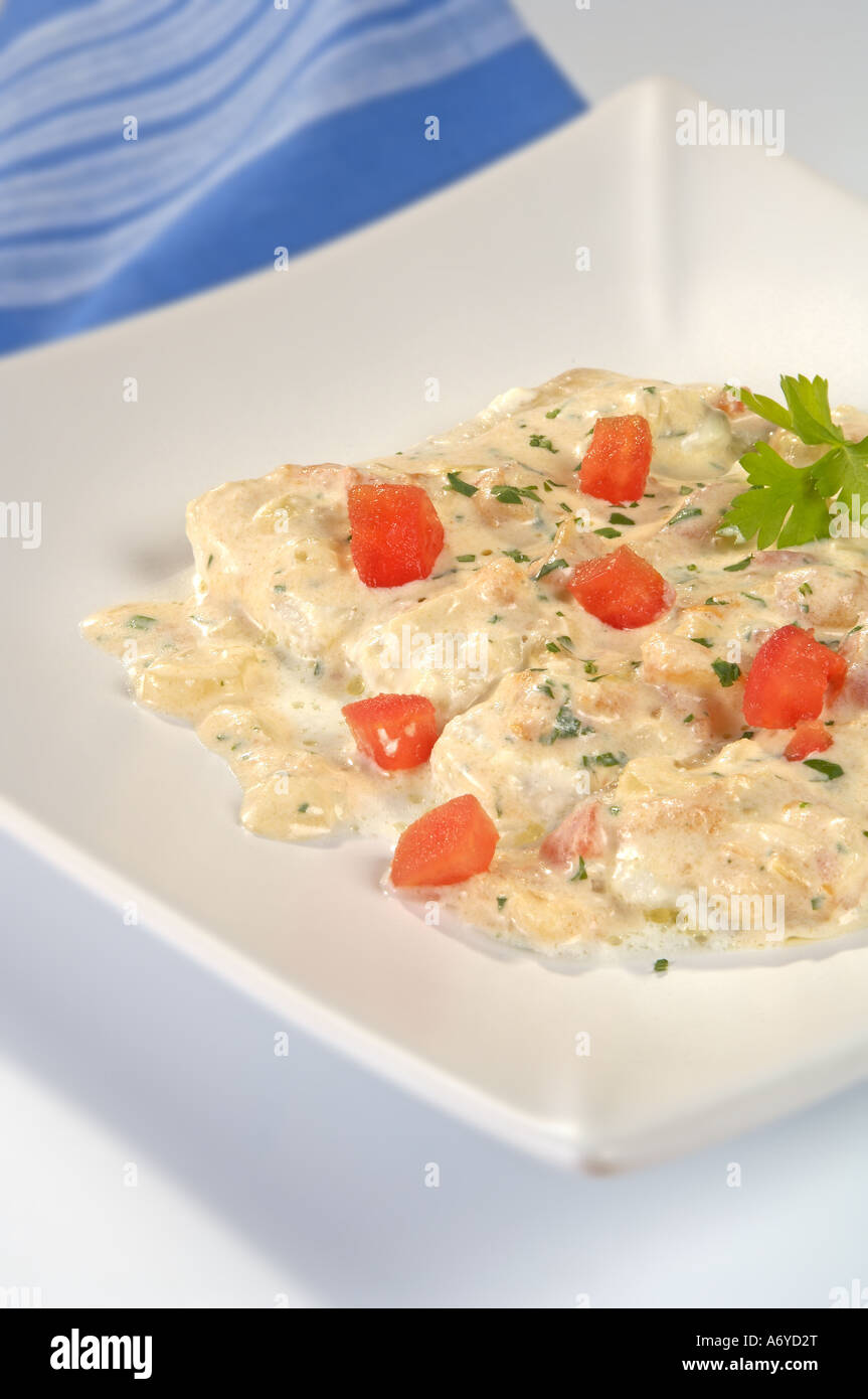 Sole with white wine sauce Stock Photo - Alamy