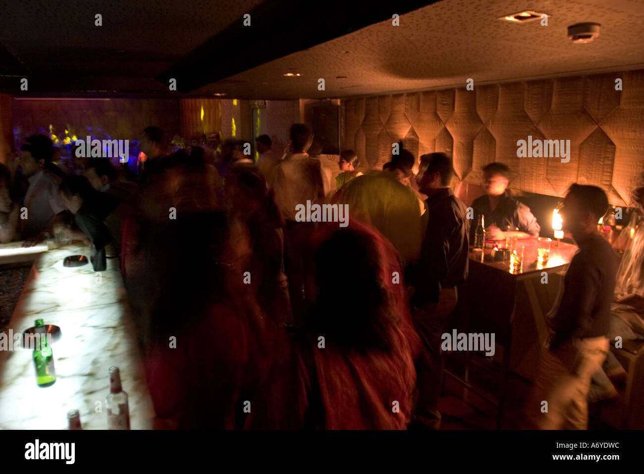 Young Indians enjoying a night out at the bar in Insomnia nightclub ...