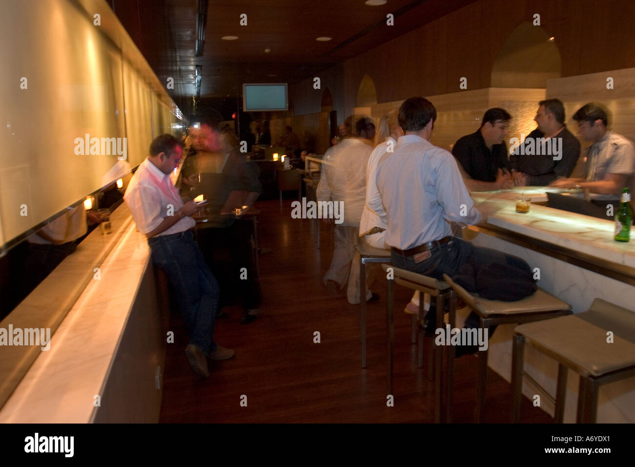 Young Indians enjoying a night out at the bar in Insomnia nightclub ...