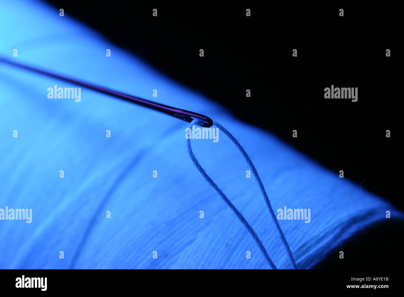 needle and thread Stock Photo - Alamy