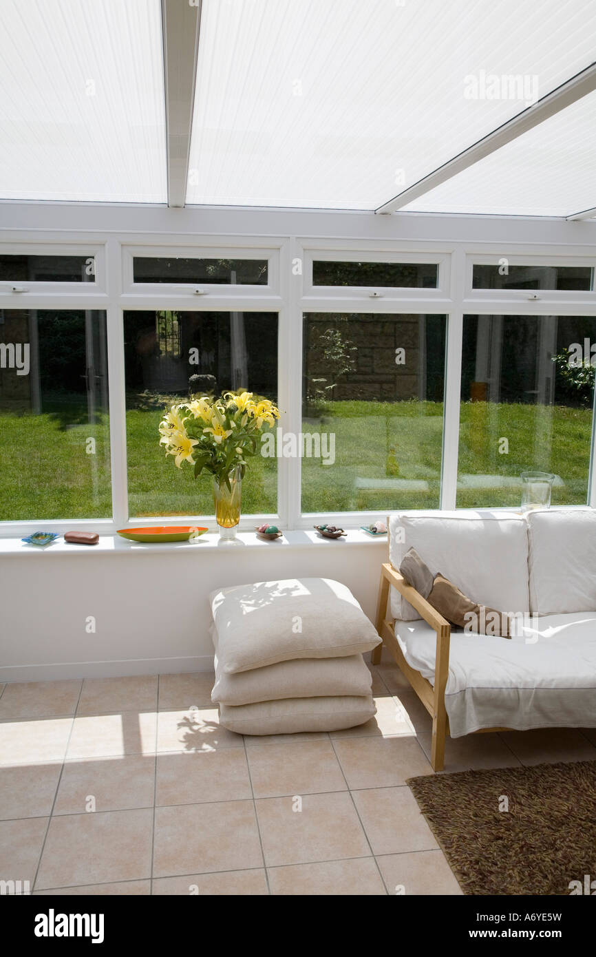 Conservatory with a view of the backyard Stock Photo - Alamy