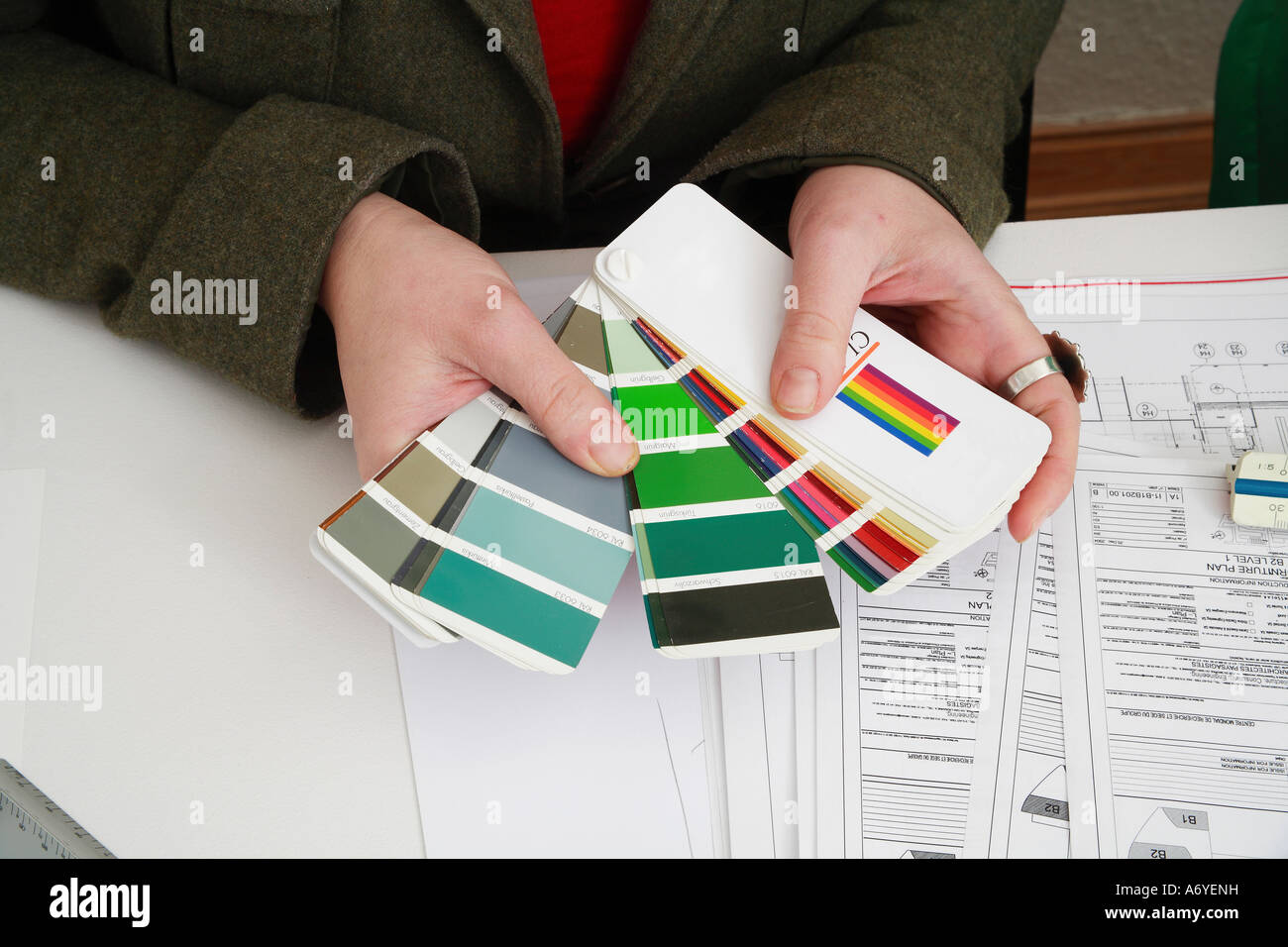 Person looking at color samples Stock Photo - Alamy