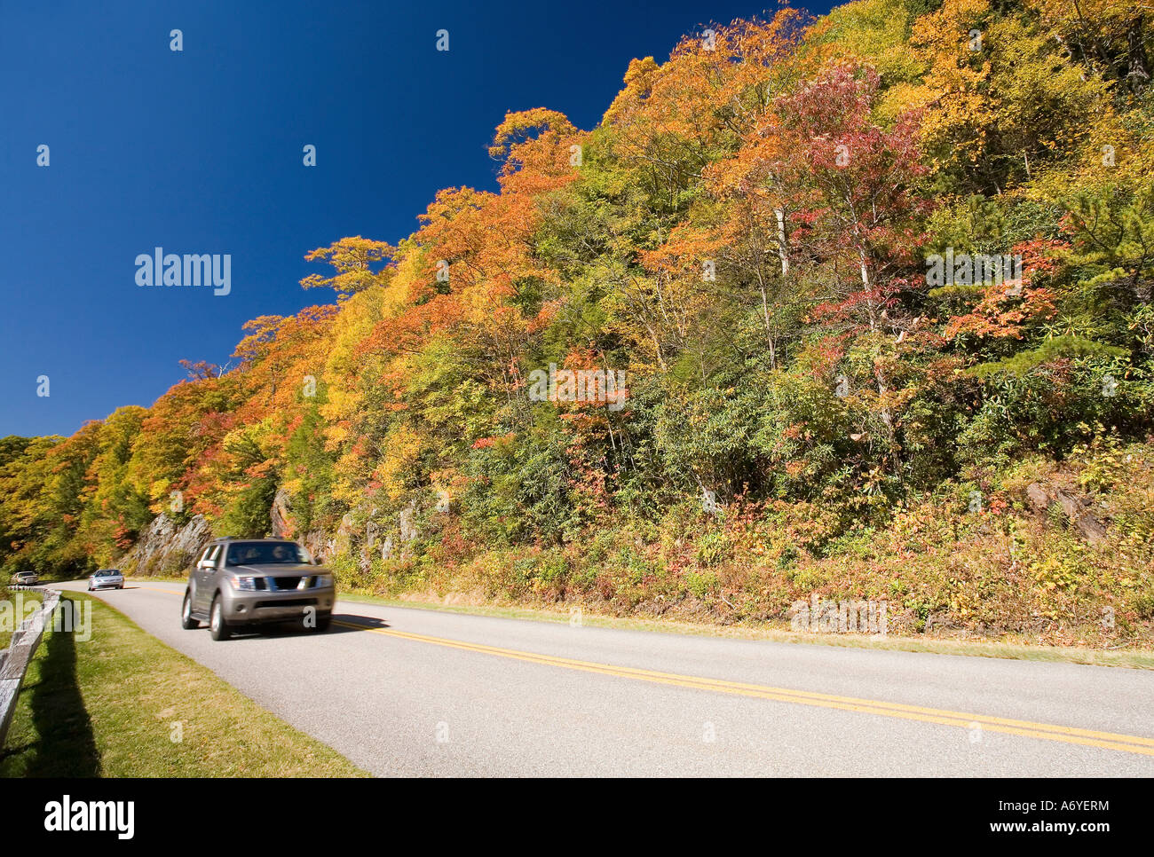 Car driving along road Stock Photo - Alamy