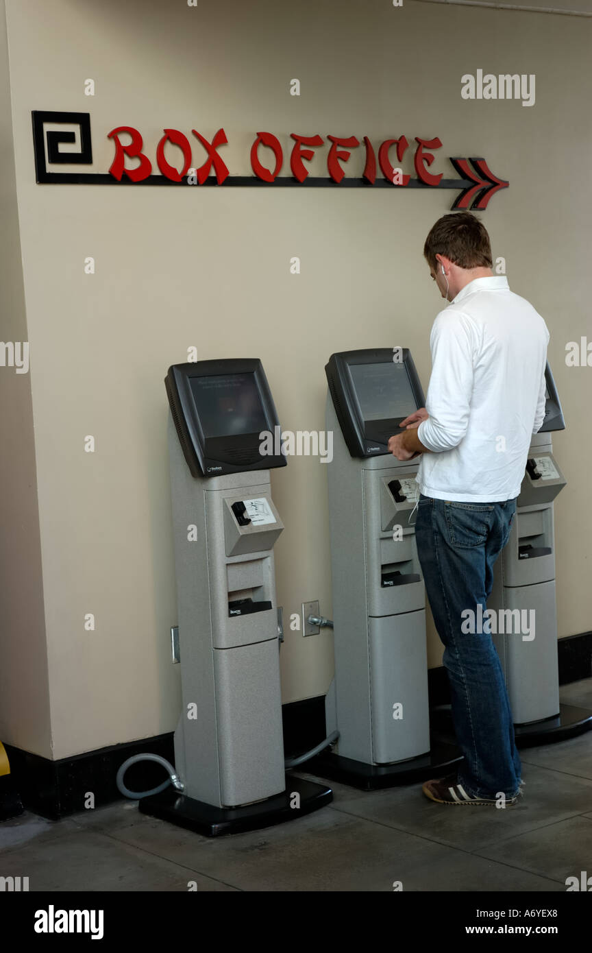 Man using a cash machine Stock Photo - Alamy