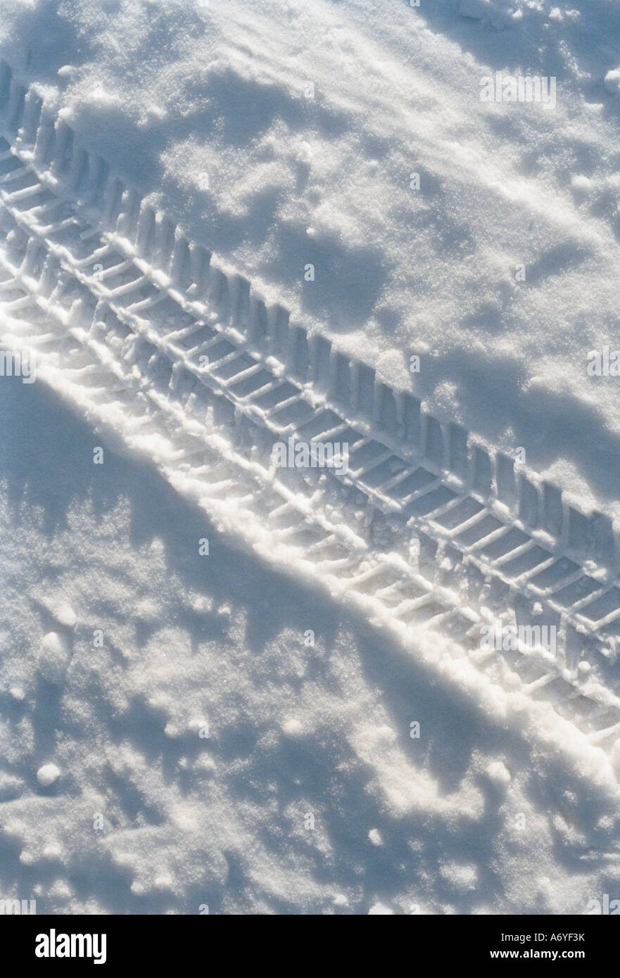 Tire track in the snow Stock Photo - Alamy