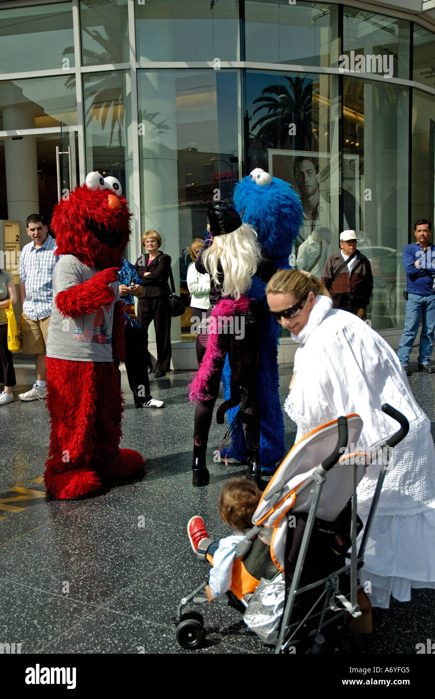 Elmo Sesame Street. Famous costumed characters try to be photographed ...