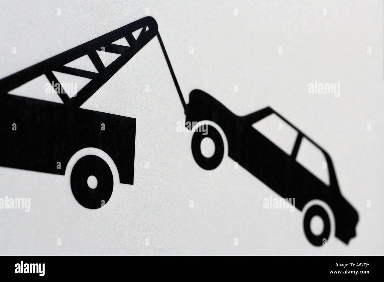 Information sign showing car being towed Stock Photo - Alamy