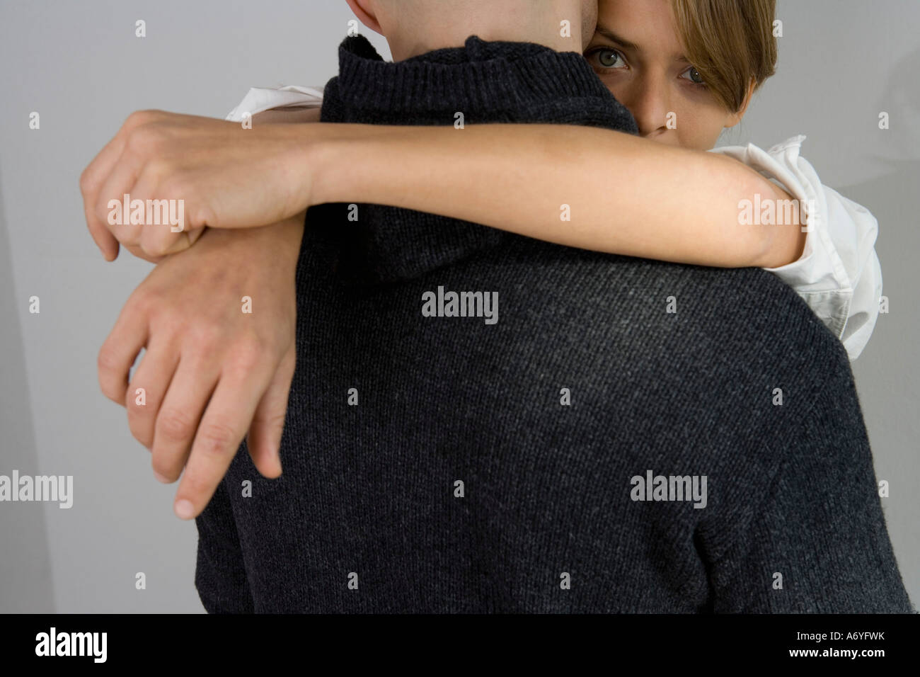 A couple embracing Stock Photo - Alamy