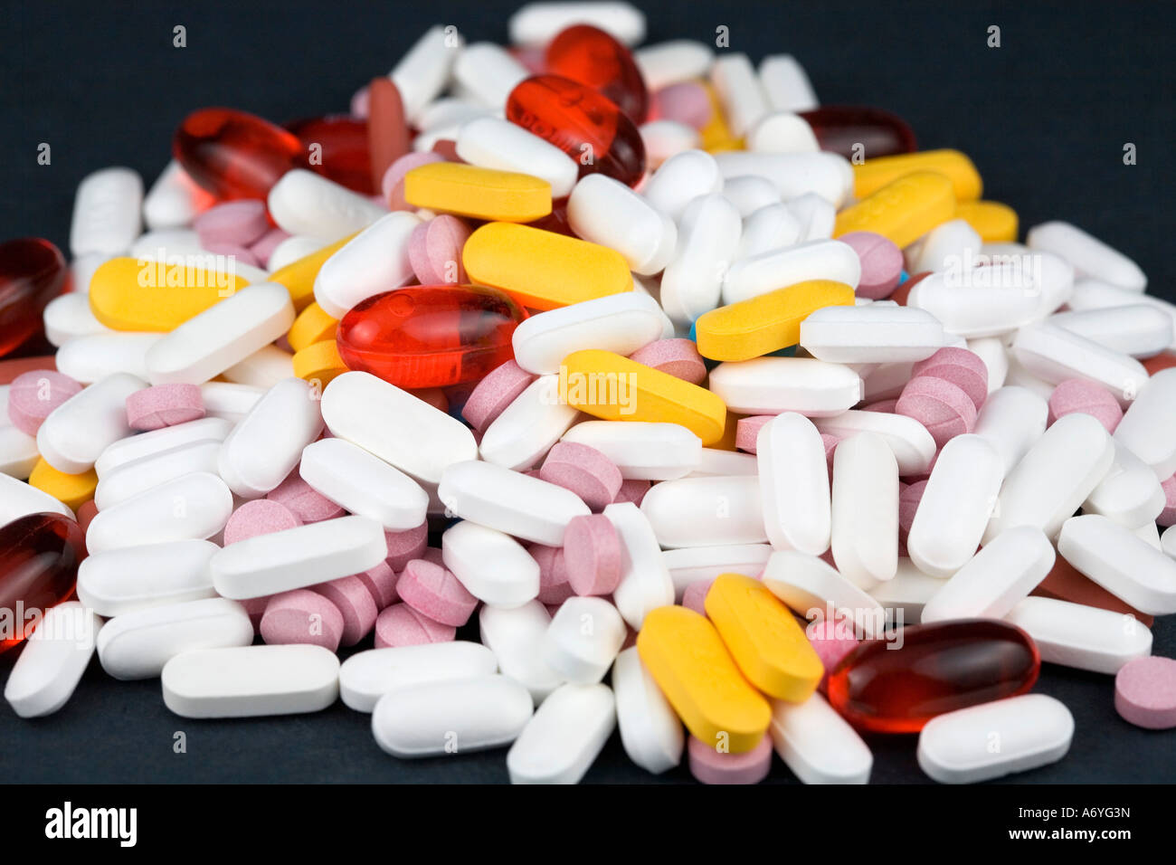 Pile of pills and capsules Stock Photo - Alamy