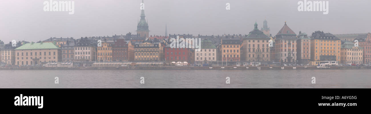 The water front at Gamla Stan, The Old Town, Skeppsbron, in foggy ...