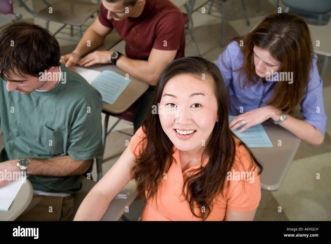 Group of students in lecture room Stock Photo - Alamy