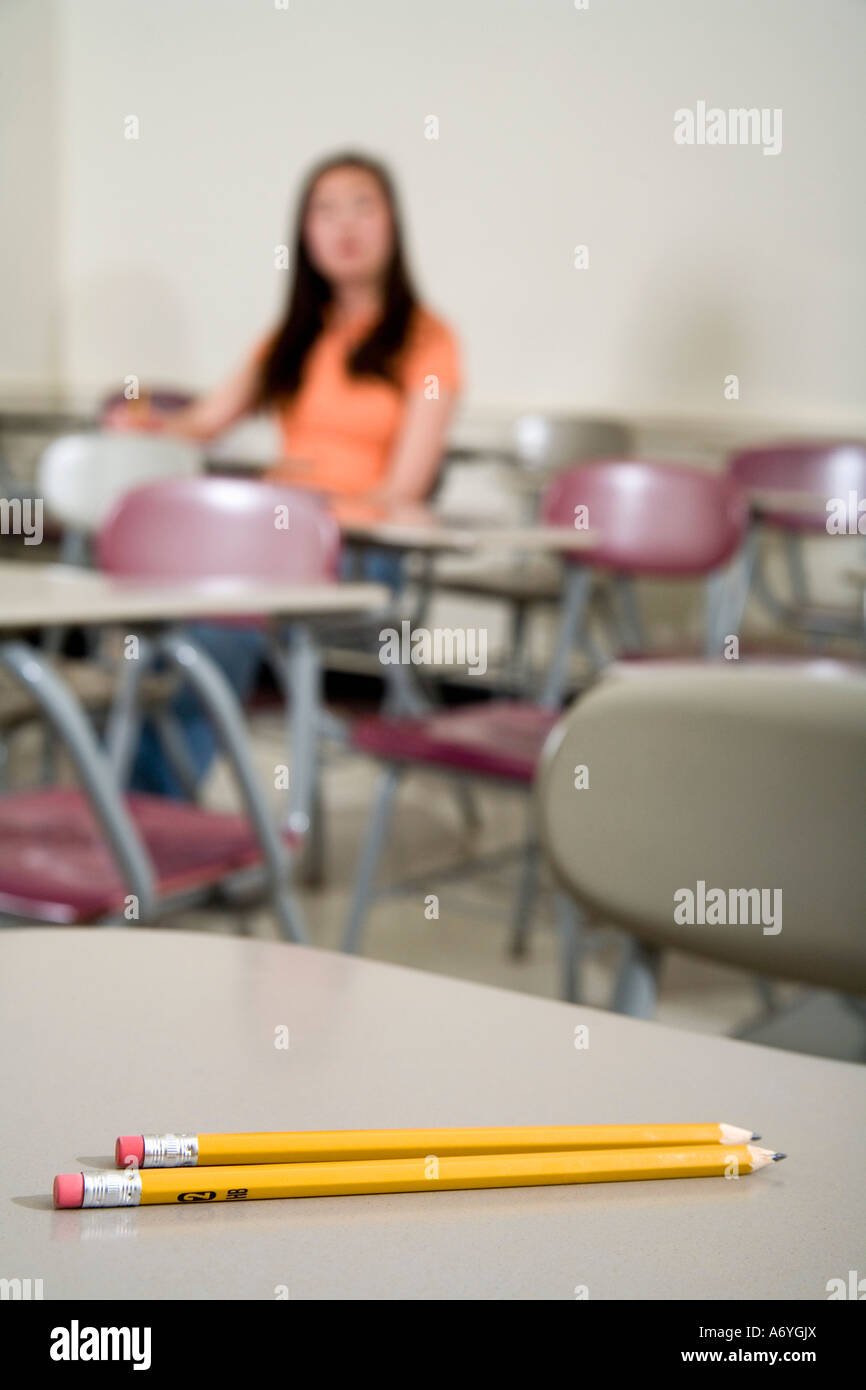 Pencils on a desk in a lecture room Stock Photo - Alamy