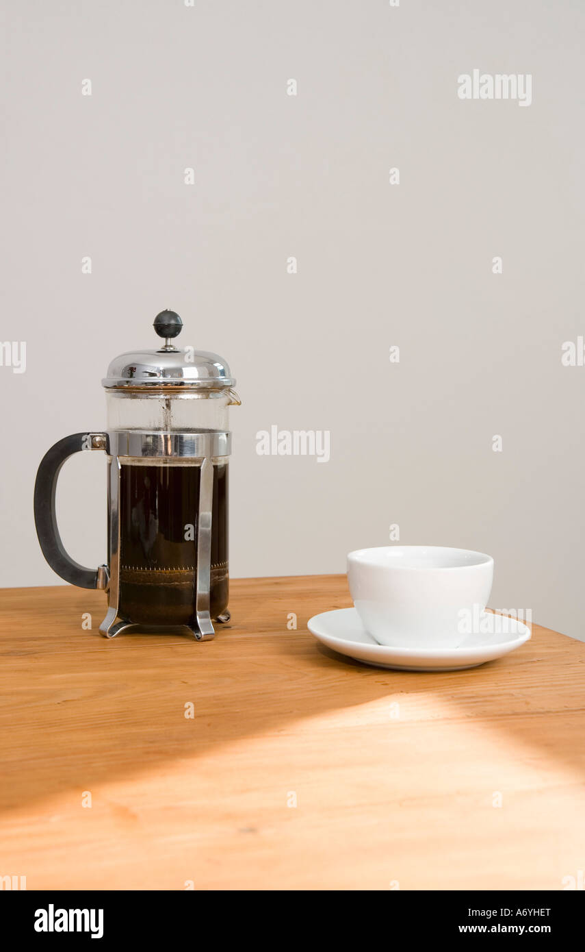 A cafetiere and coffee cup Stock Photo - Alamy