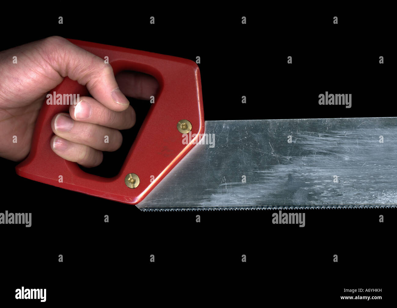 Man holding a saw Stock Photo - Alamy