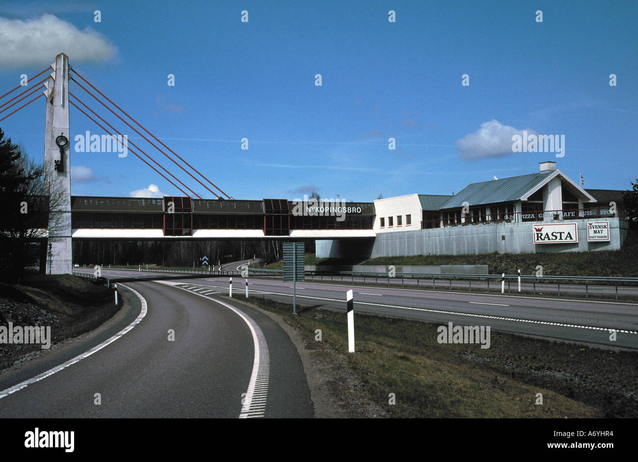 A combined rest area, restaurant, bridge, that spans the freeway or ...