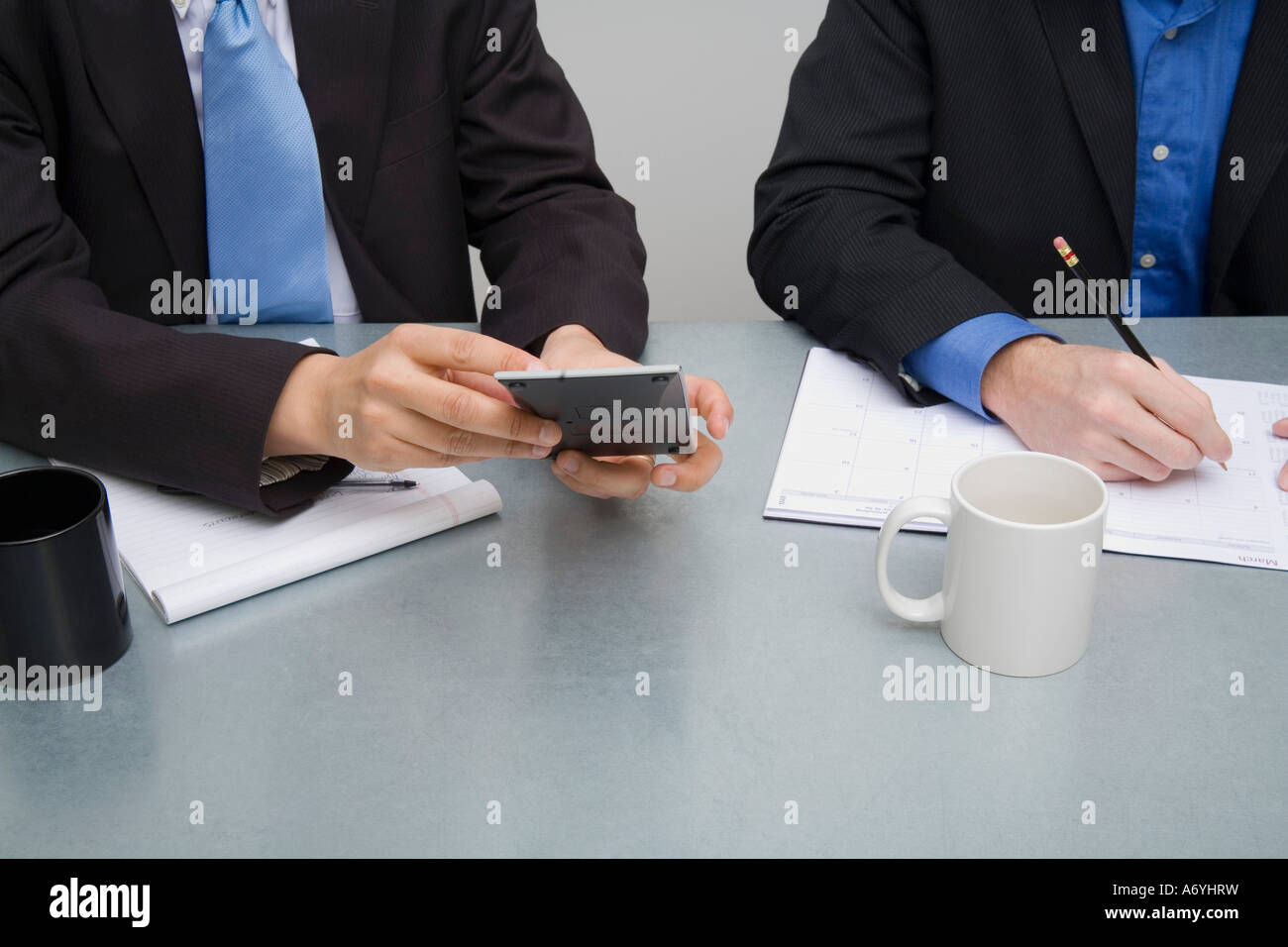 Two men table unknown hi-res stock photography and images - Alamy