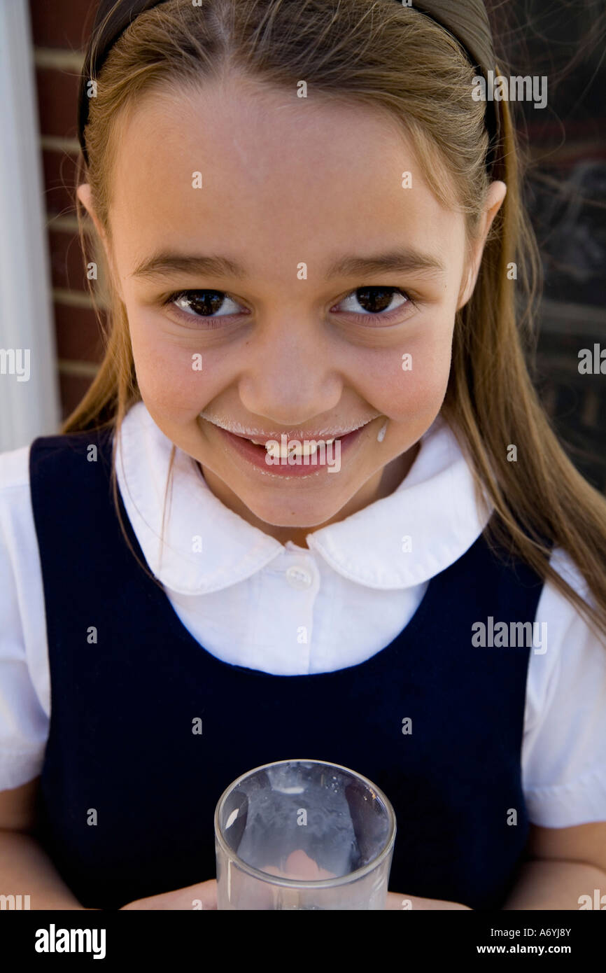 School girl drinking milk Stock Photo - Alamy