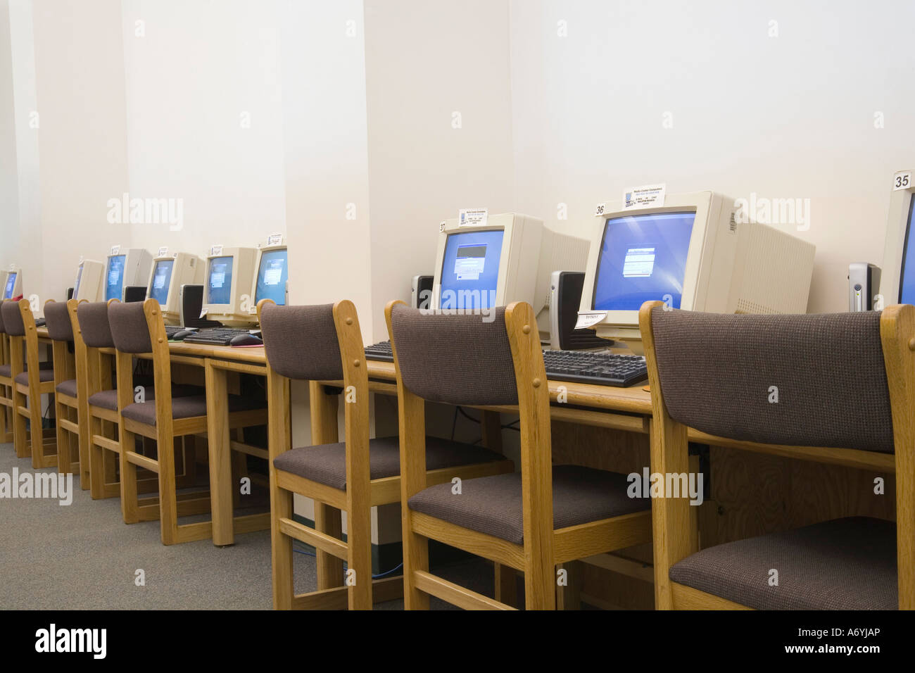 A row of computers in school library Stock Photo - Alamy