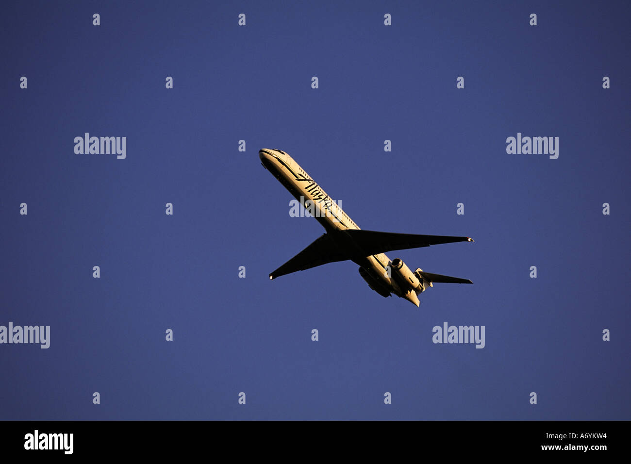 Alaska Airlines passenger jet in blue sky Stock Photo - Alamy