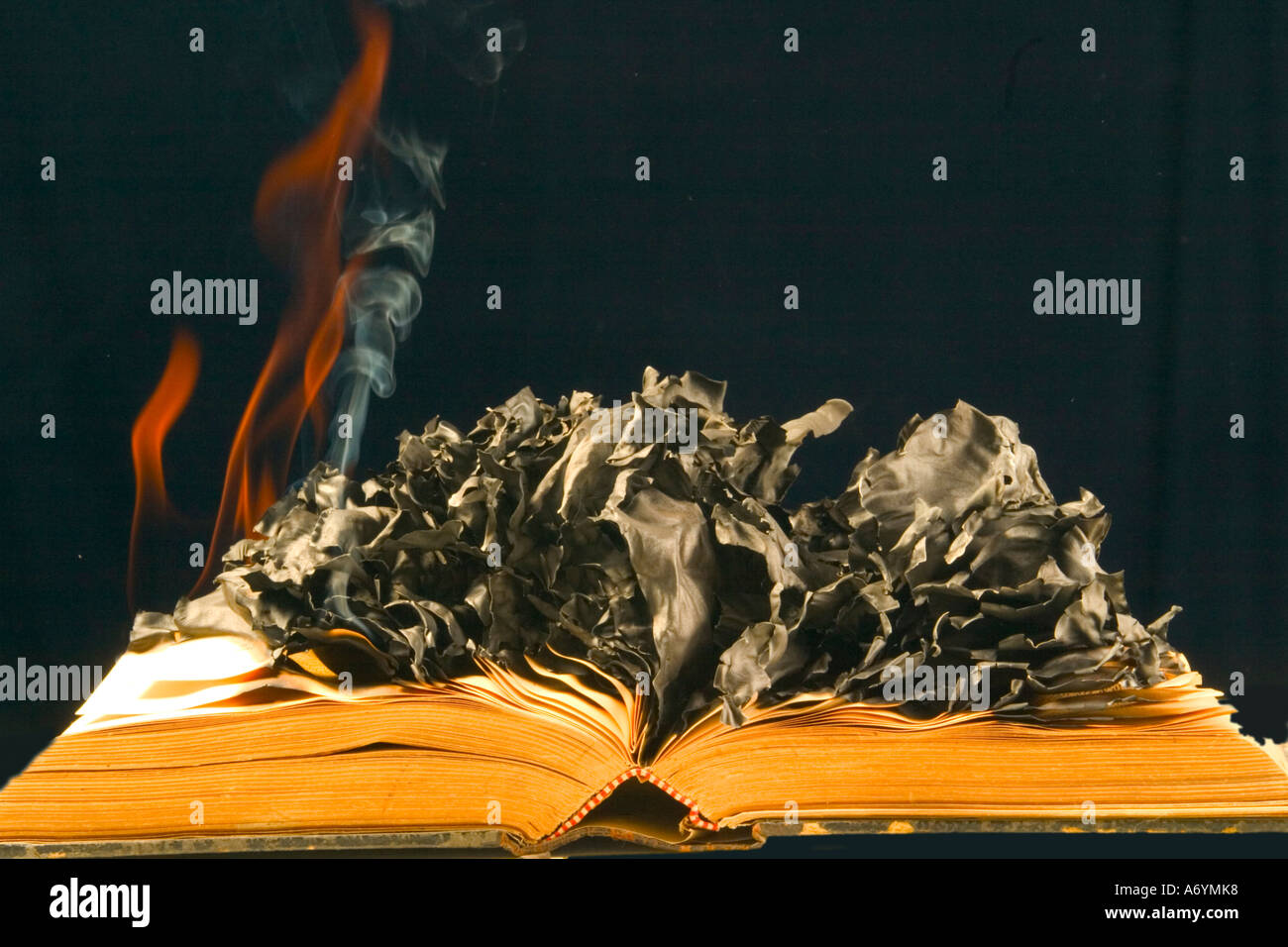 Burning old book Stock Photo - Alamy