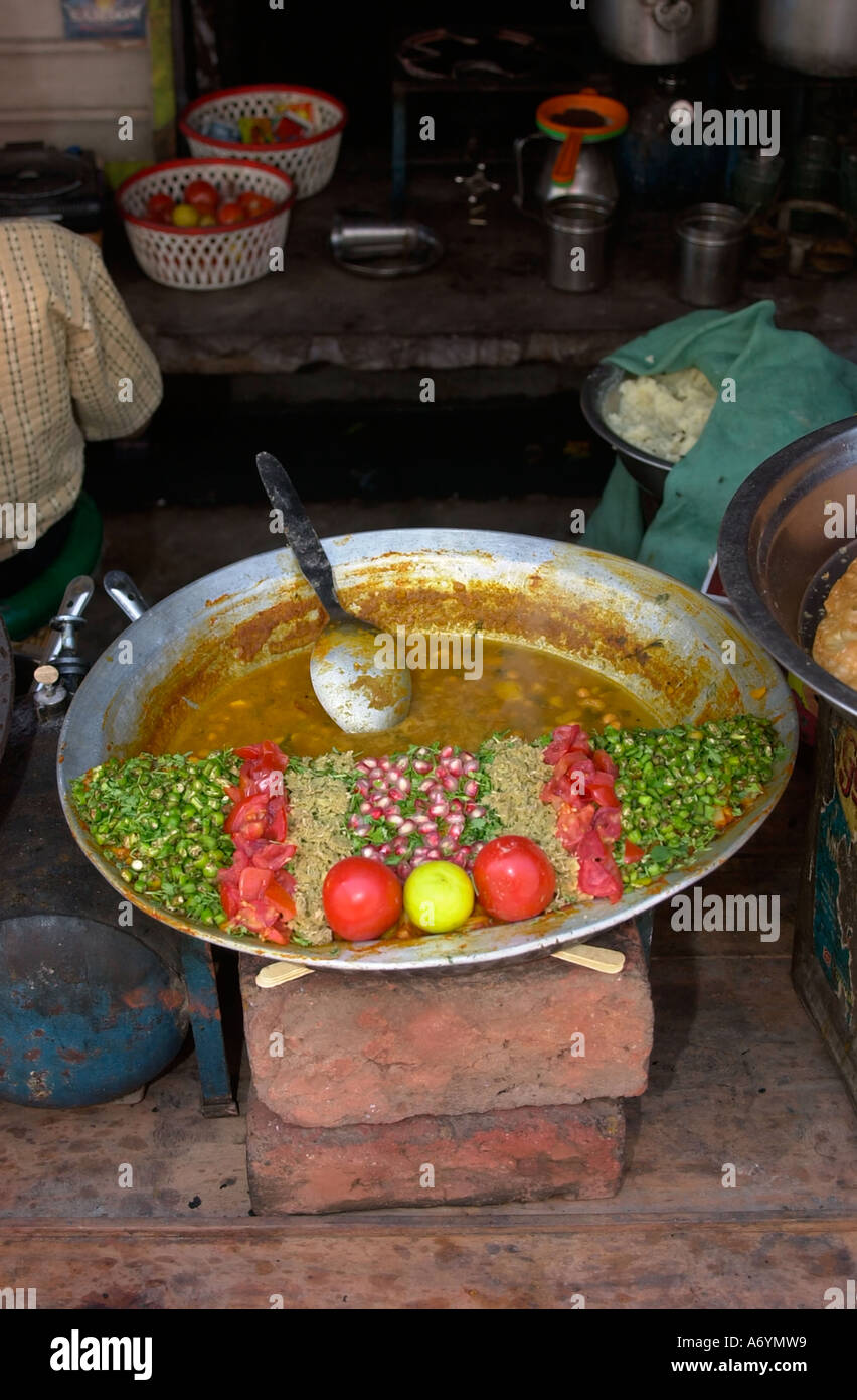 Coked food for sale at an open market in Puskhar, India Stock Photo - Alamy