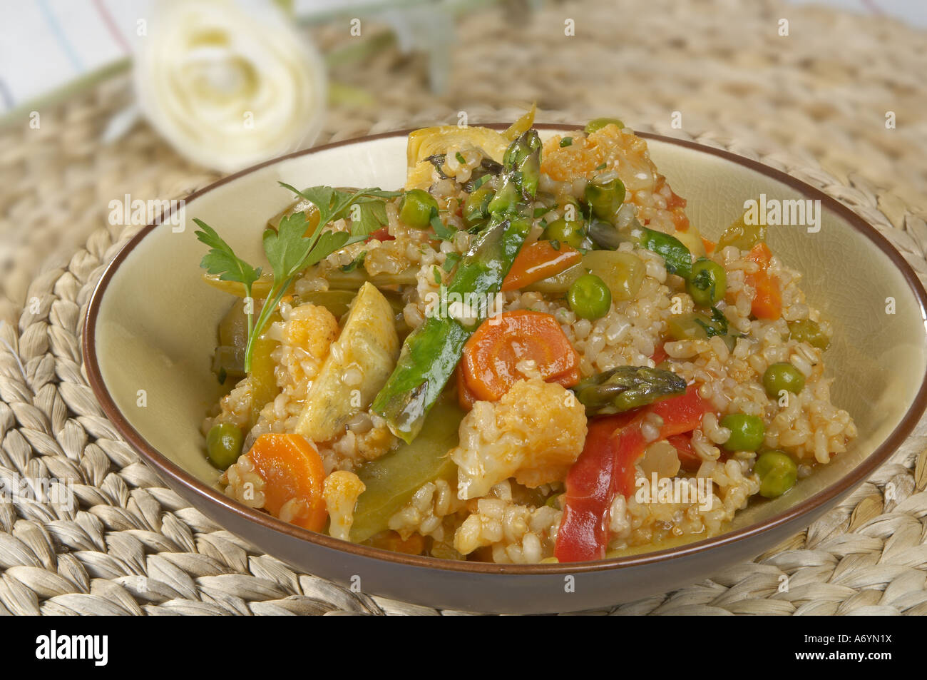 Brown rice with spring vegetables Stock Photo - Alamy