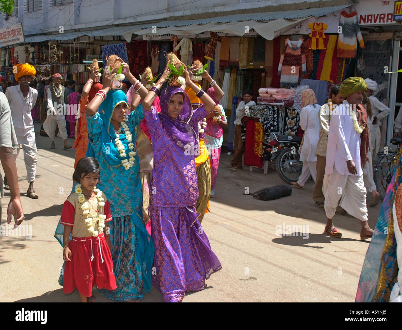 Native Women in Northern India town dressed in colorful traditional ...