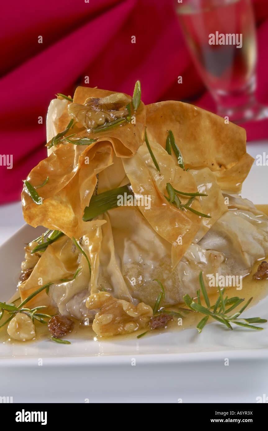 Apple walnut and rosemary pastry purses Stock Photo - Alamy