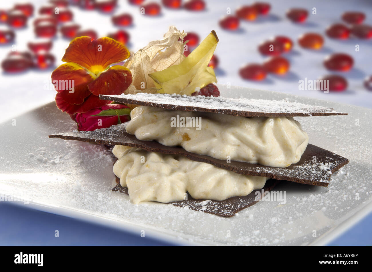 Chocolate millefeuille pastry and kaki persimon mousse Stock Photo - Alamy