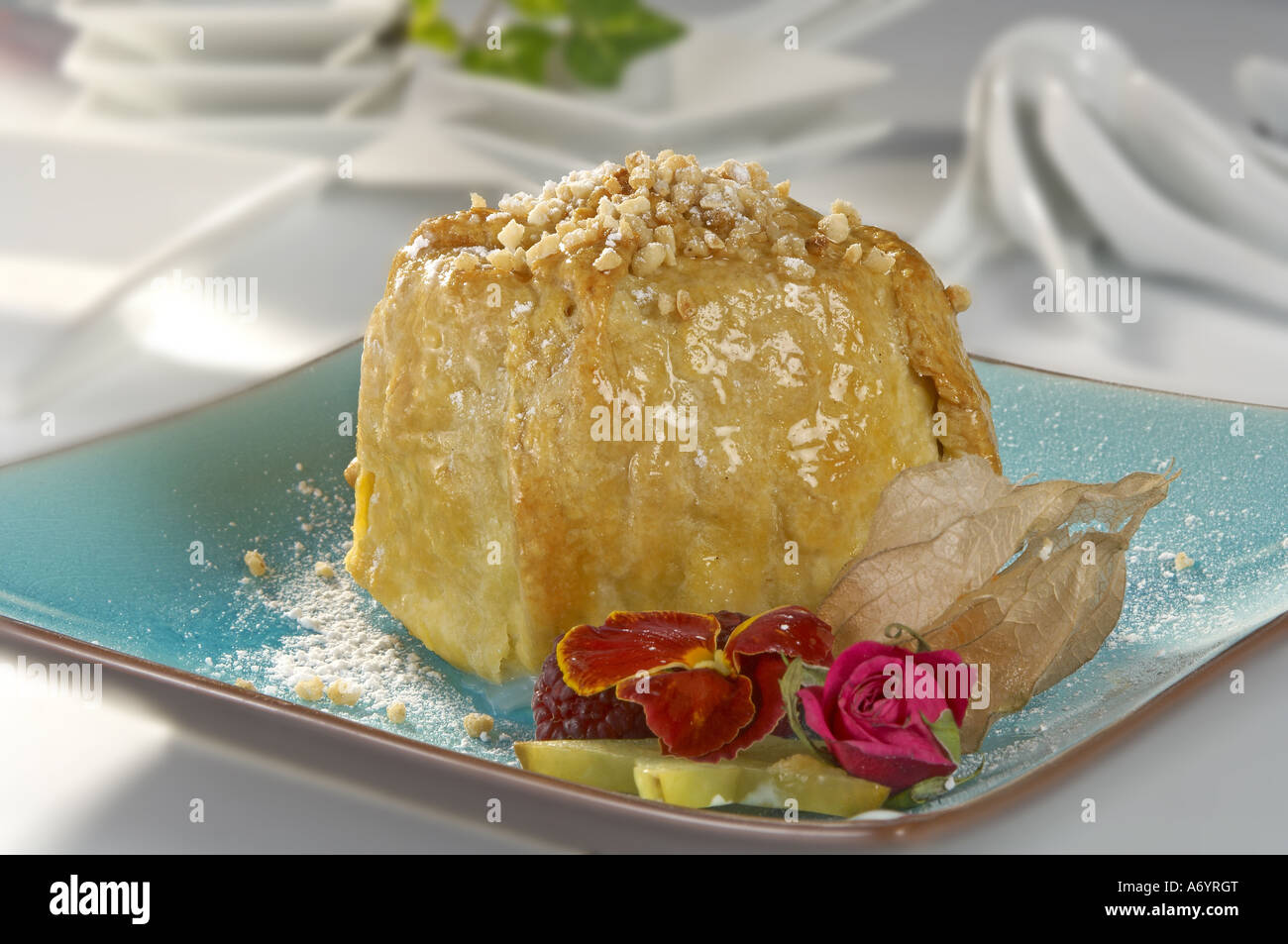 Kaki persimon puff pastry with crème patisserie Stock Photo - Alamy