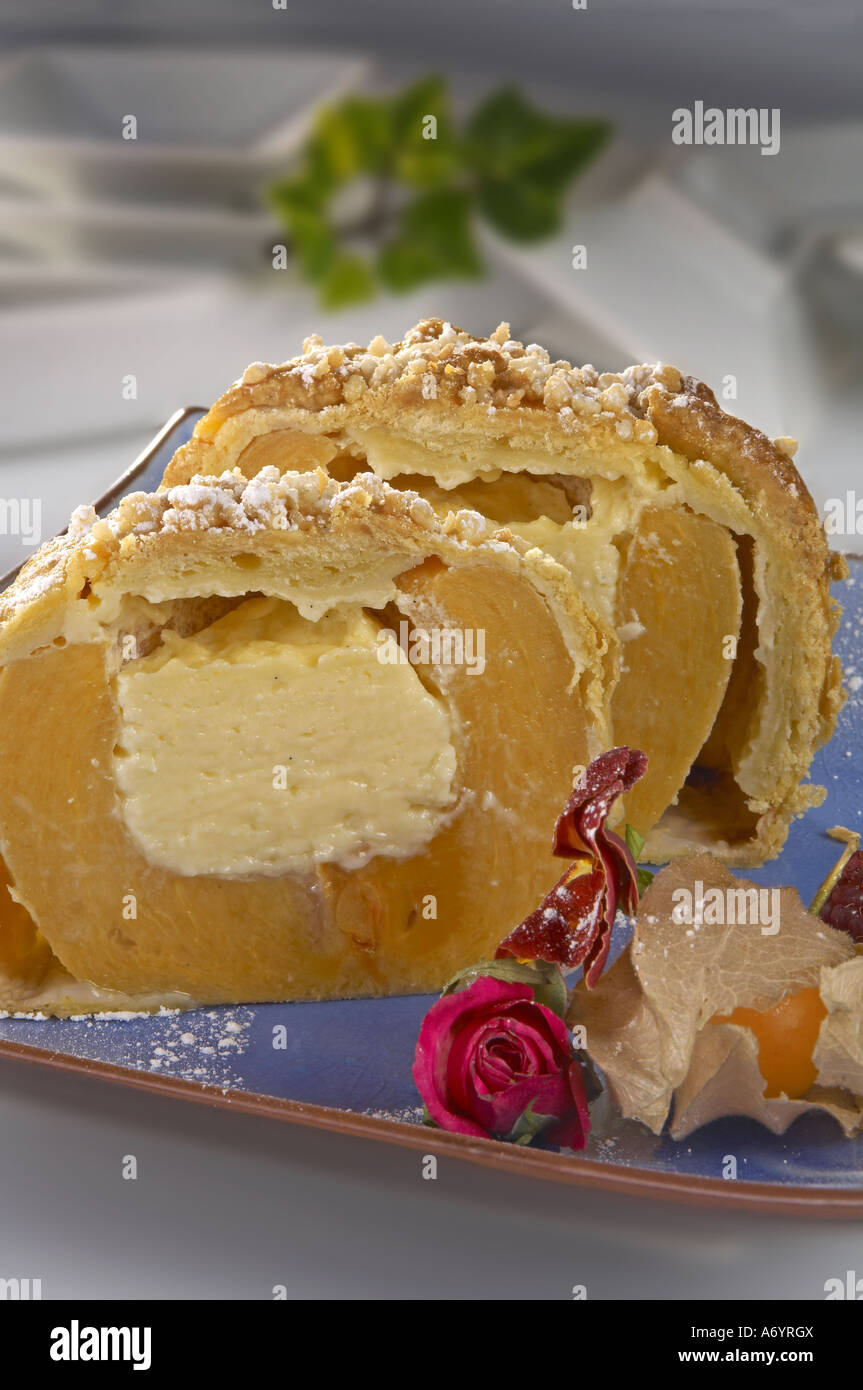 Kaki persimon puff pastry with crème patisserie Stock Photo - Alamy